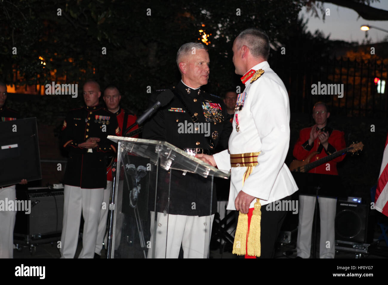 U.S. Marine Corps Gen. James F. Amos, center left, the commandant of ...