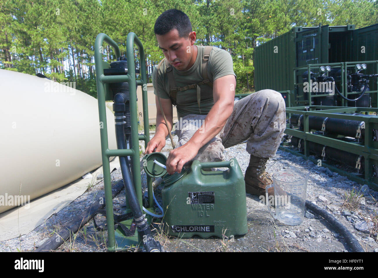 Lance Cpl. Eric D. Rivera, a Houston, Texas native, water purification ...