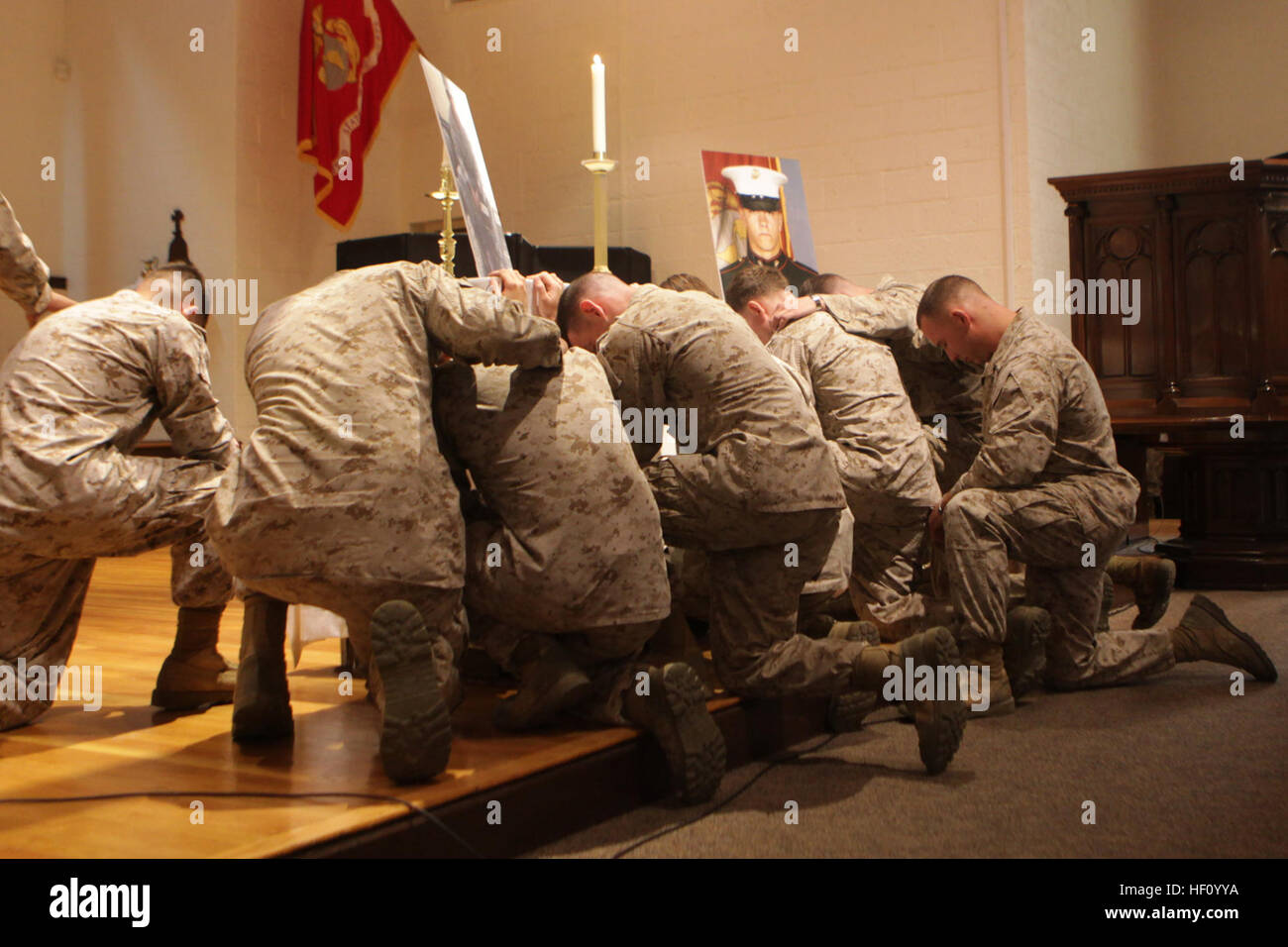 Marines with 2nd Law Enforcment Battalion huddle together in silence in ...