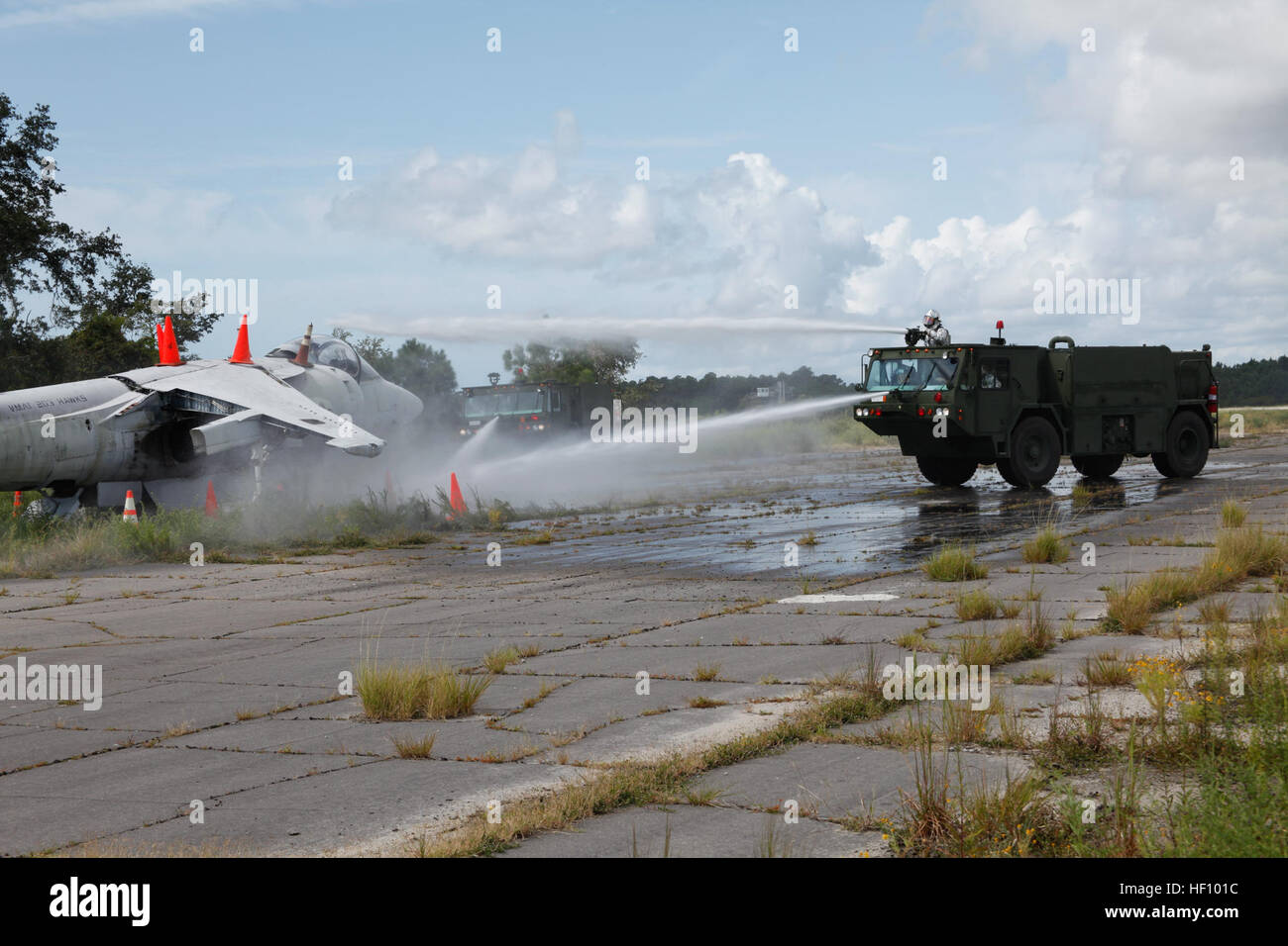 Aircraft rescue firefighter conducts hi-res stock photography and ...