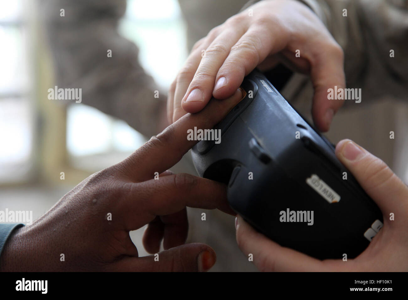 U.S. Marine Corps Sgt. Chad J. Twenter, right, with the Musa Qa'leh ...