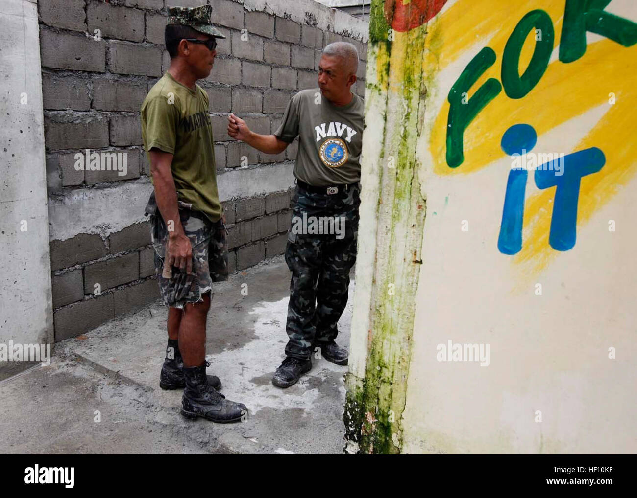Republic of the Philippines Marine GySgt Arnold Navalta and Seabee Builder Cleto Grimaldo ...