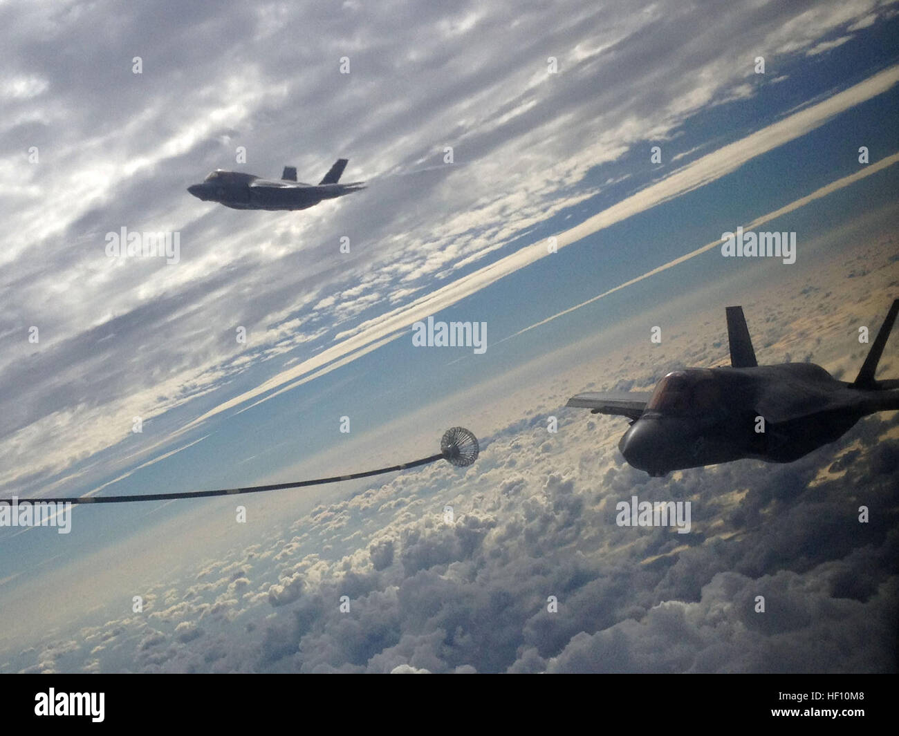 Two F-35B Joint Strike Fighters conduct the first aerial refueling of ...