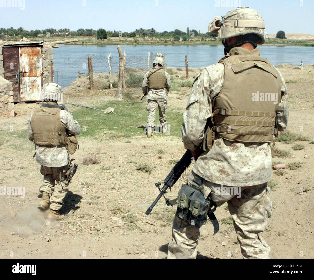 Three Marines from Weapons Company, 3rd Battalion, 6th Marine Regiment ...