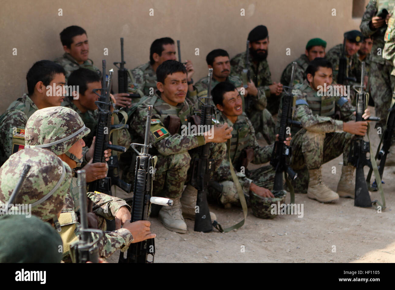 Afghan National Army soldiers listen to a class on proper patrol ...