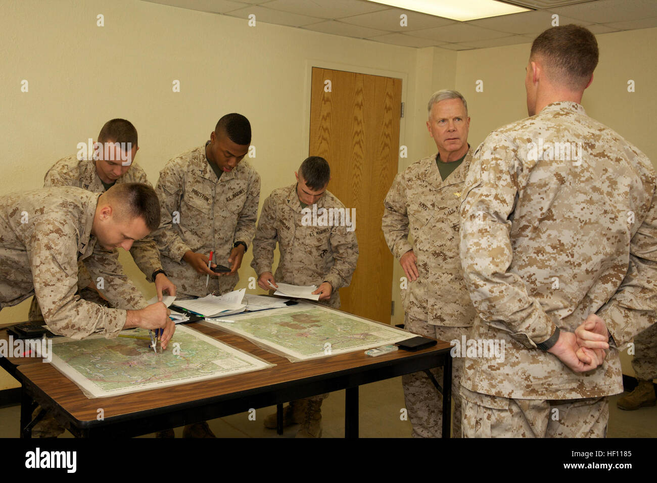 The commandant of the Marine Corps, Gen. James F. Amos, second from ...