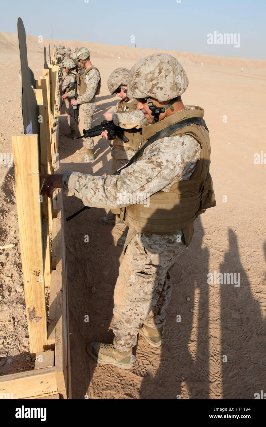 U.S. Marines with 3rd Marine Aircraft Wing (Forward) assess their ...