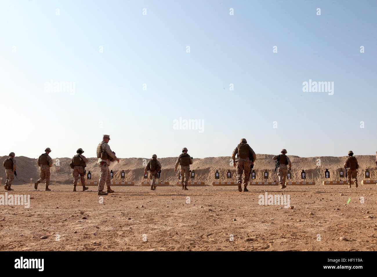 U.S. Marines with 3rd Marine Aircraft Wing (Forward) walk to their ...