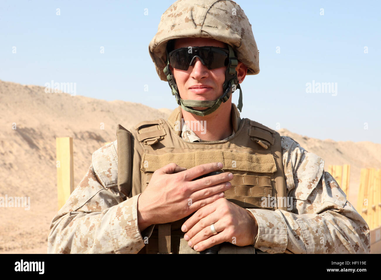 A Marine armory chief conducts a battlefield zero at a firing range on ...