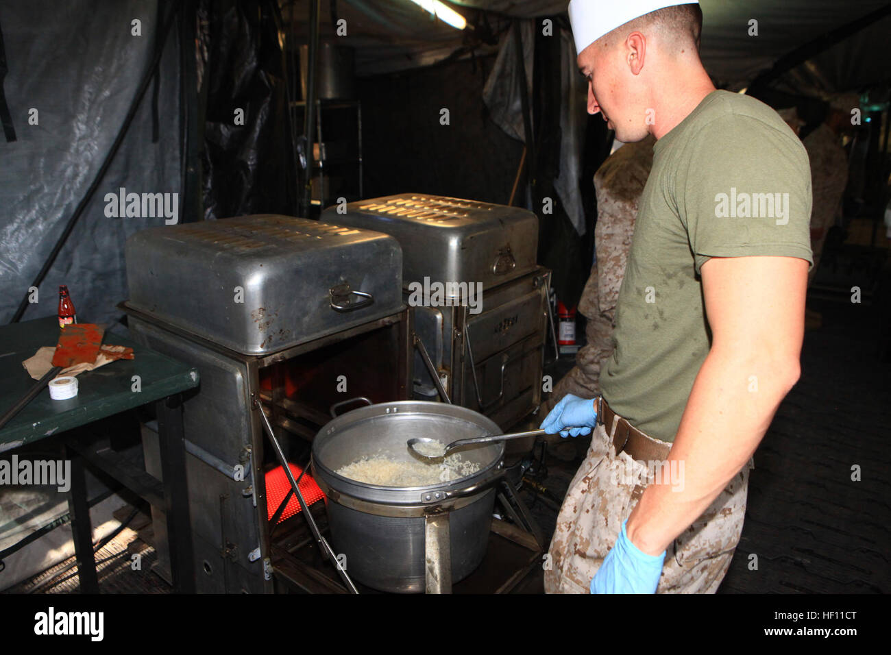 Sgt. Christopher Womack, the chief cook at Food Service Company, Combat ...