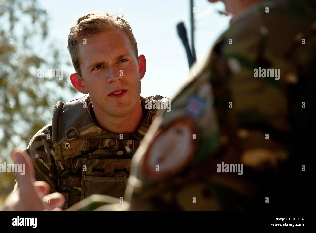 Flight Lt. Samuel Mitchell, left, a joint terminal attack controller in ...