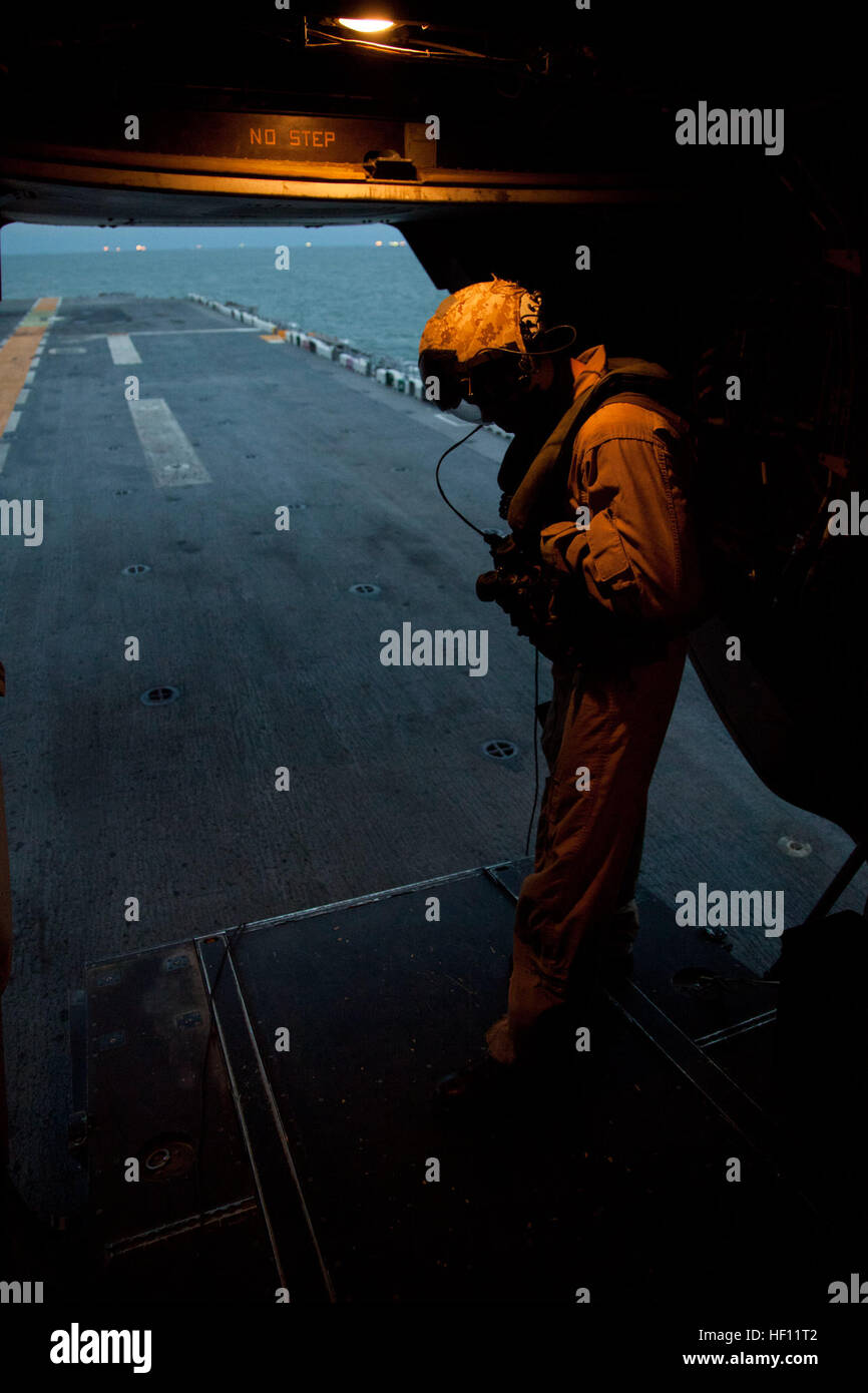 An MV-22B Osprey crew chief assigned to Marine Medium Tiltrotor ...