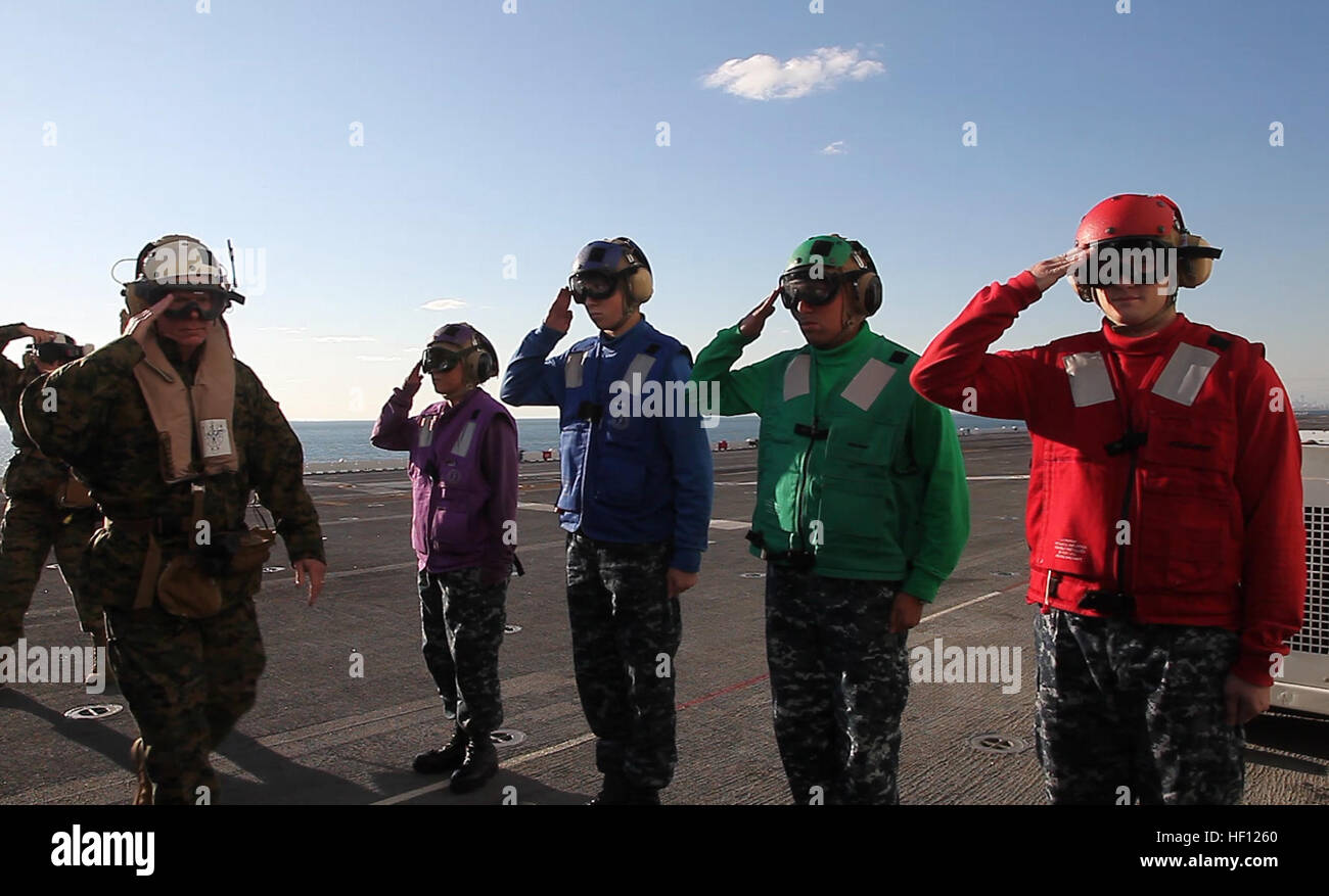 General James F. Amos, Commandant of the Marine Corps, renders a salute ...