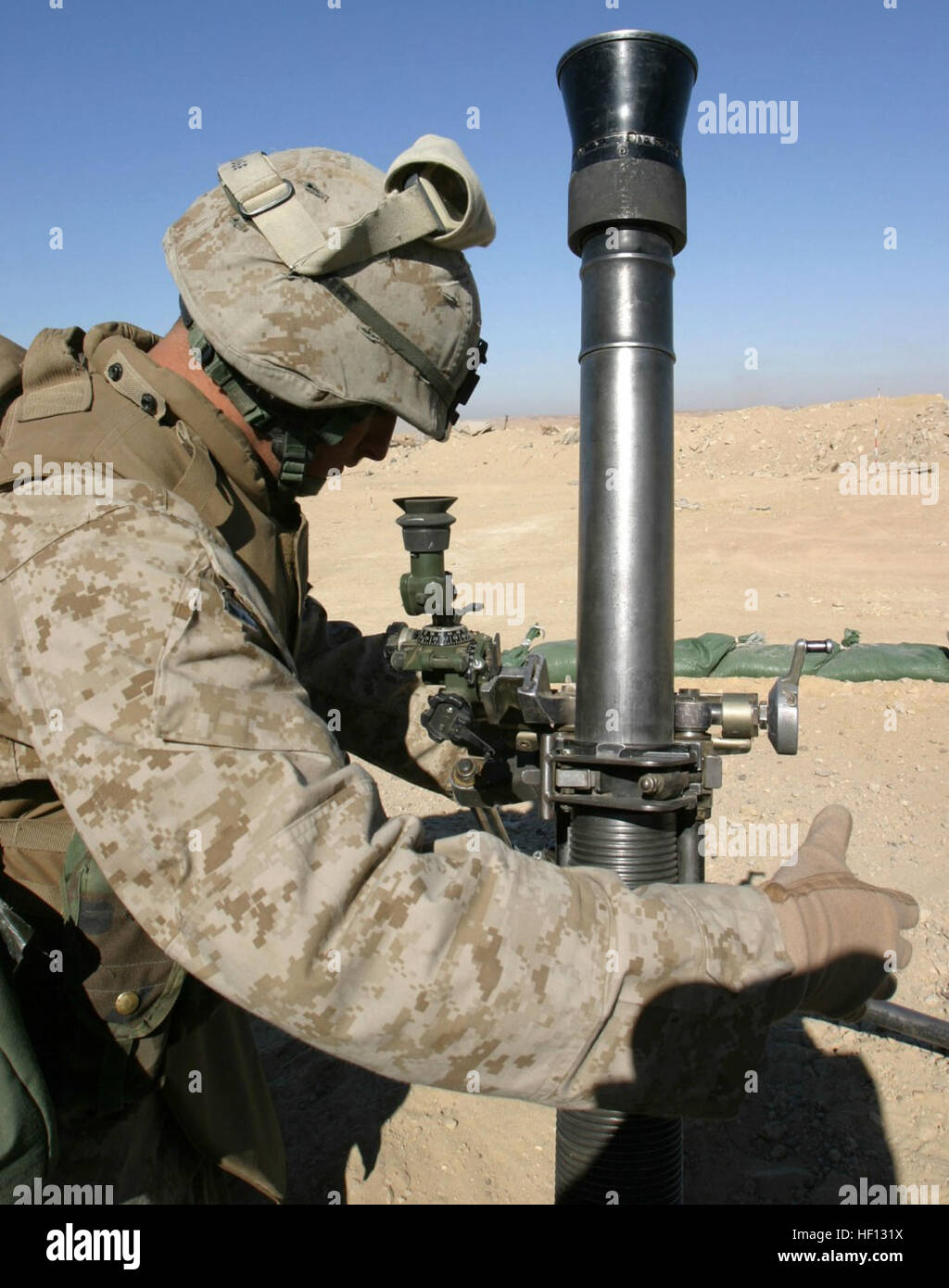 An 81mm mortarman from Battalion Landing Team 1st Battalion, 2nd ...
