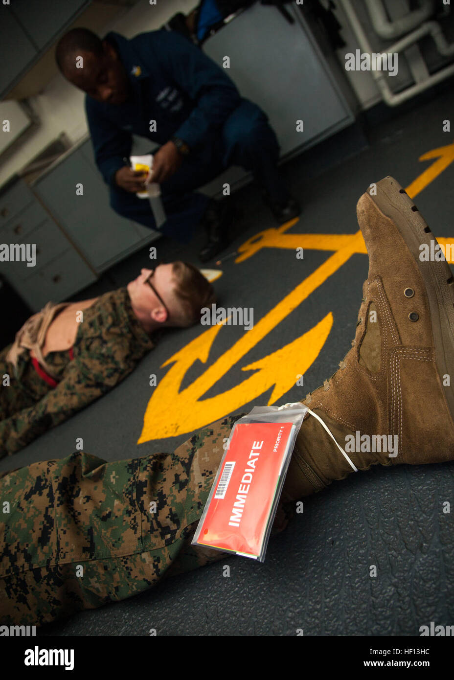 An "immediate" tag is tied to the boot of a Marine assigned to 26th ...