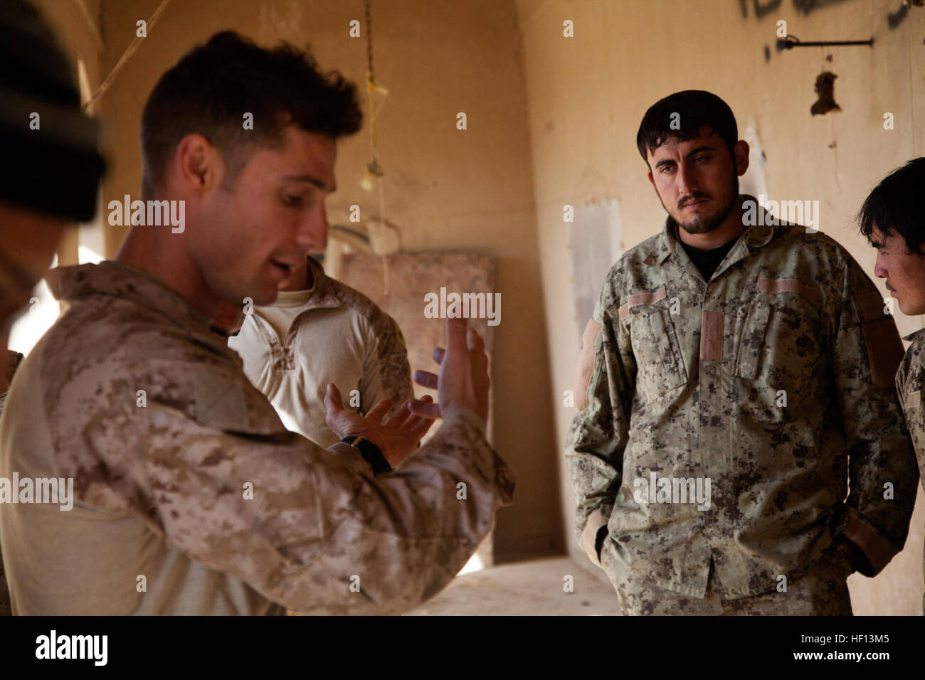 Afghan National Civil Order Policemen (ANCOP) listen as U.S. Navy ...