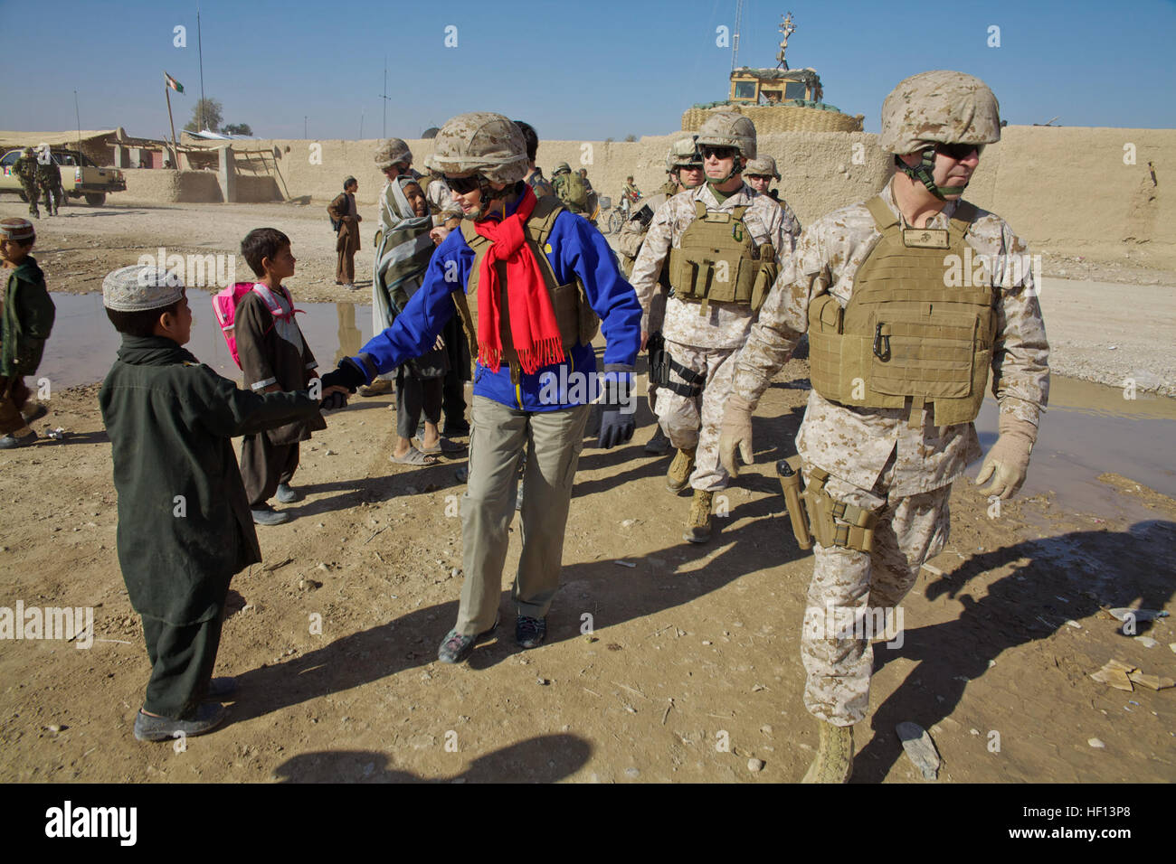 Bonnie Amos, center, the wife of Commandant of the Marine Corps Gen ...