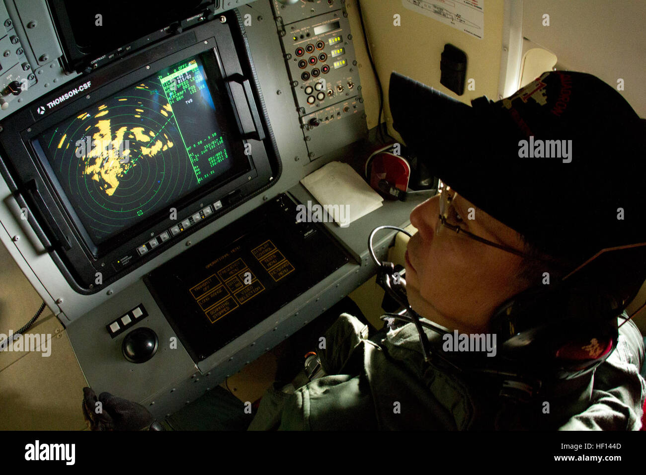 A Japanese Maritime Self Defense Force (JMSDF) service member looks up ...