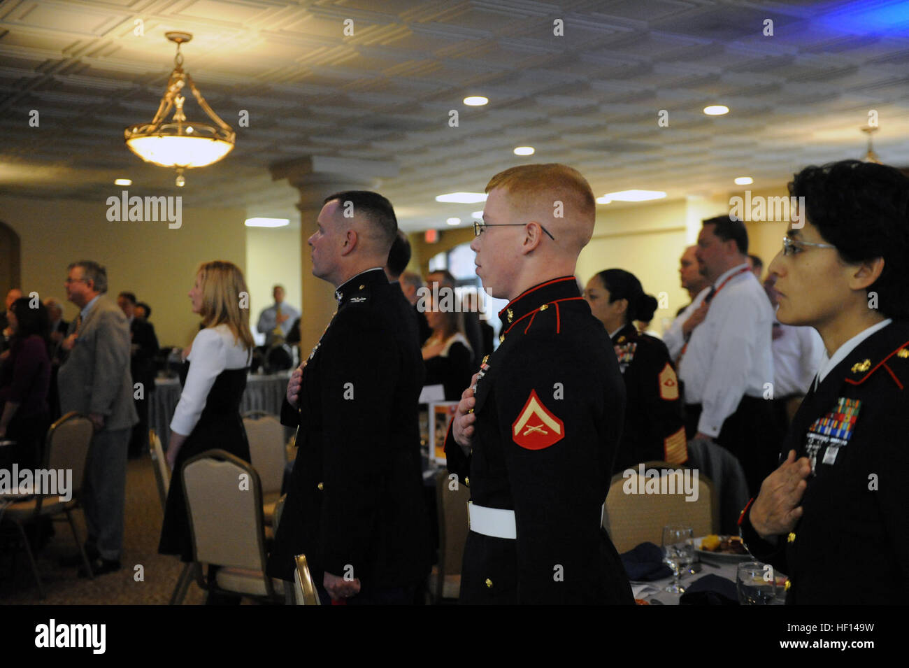 Marines representing Marine Corps Base Quantico stand to say the Pledge ...