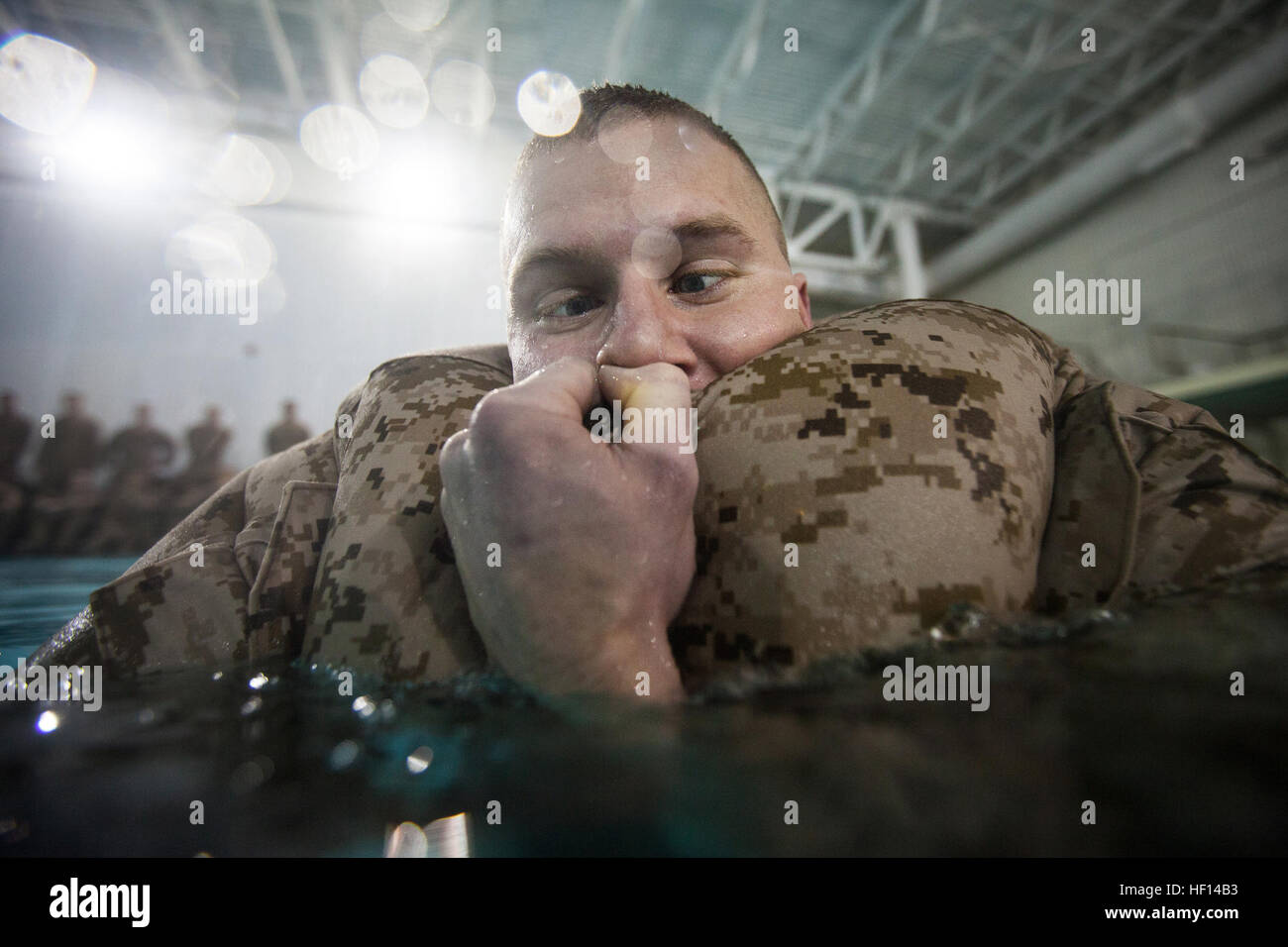 A Marine from Bravo Company, The Basic School, performs a blouse ...