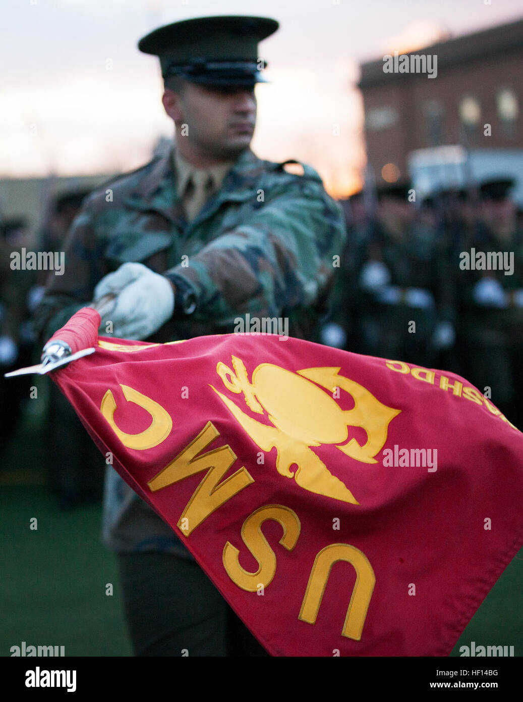 Lance Cpl. Asin Arian, guide bearer with Bravo Company, presents the ...