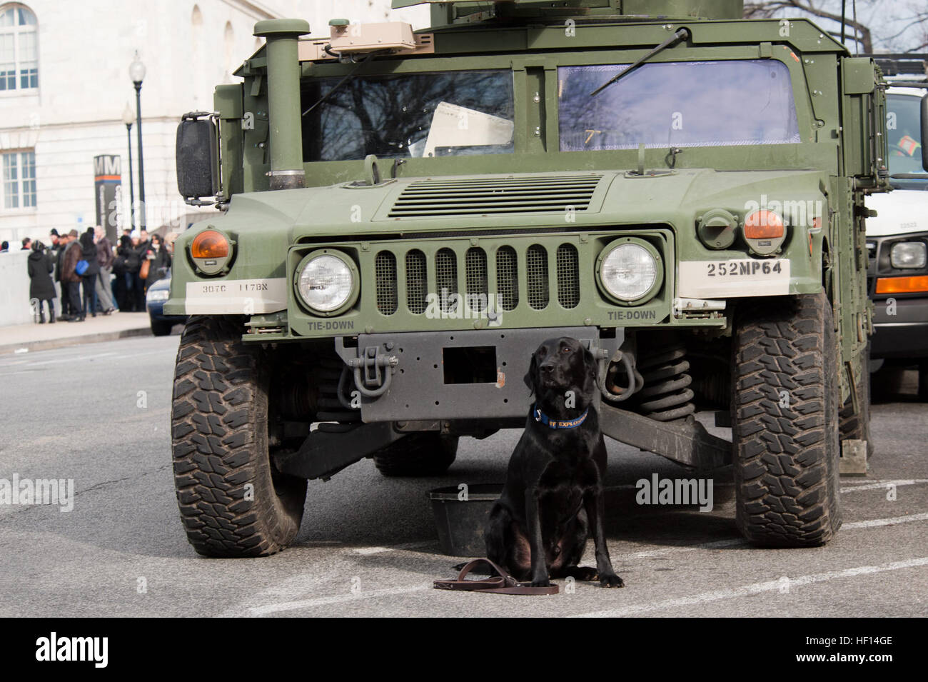 Officer Cody sits in front of a Military Humvee during the 57th ...