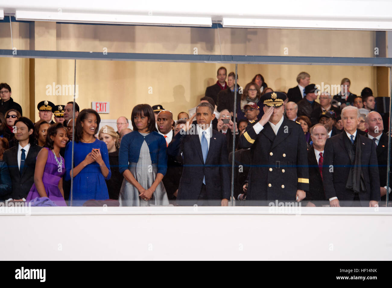 President Barack Obama salutes U.S. military members passing by the ...