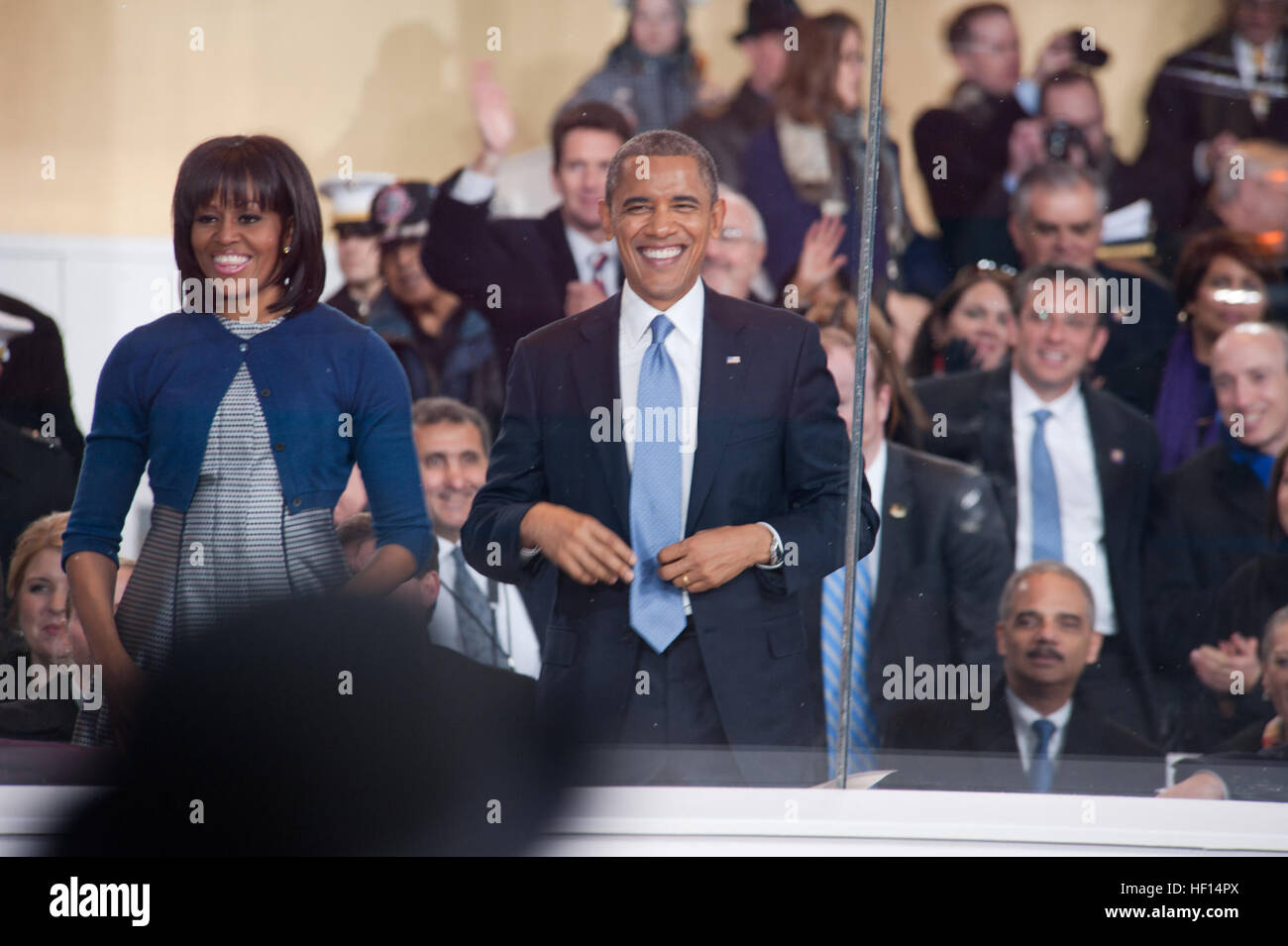 President Barack Obama and first lady Michelle Obama cheer performers ...