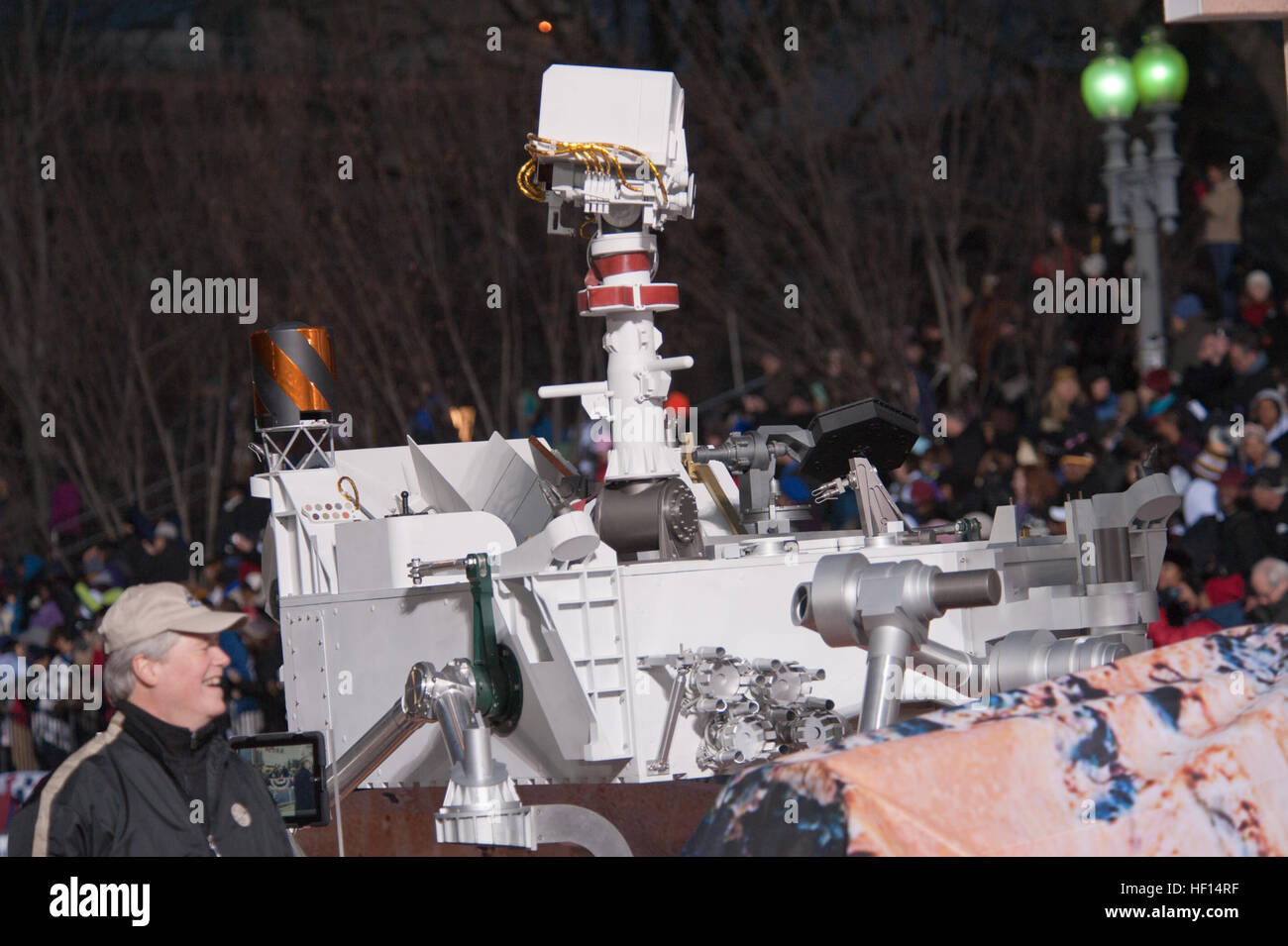 A replica of NASA's Curiosity Mars rover and members of the Mars ...