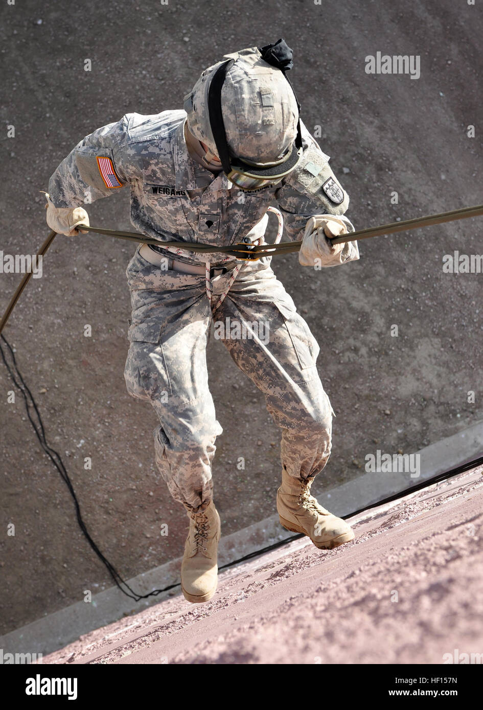 U.S. Army Spc. Kenneth Weigang, a multiple-launch rocket system crew ...