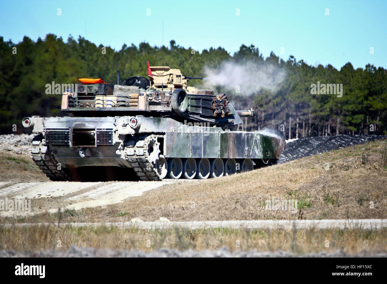 A tank with 2nd Tank Battalion, 2nd Marine Division, fires its weapon ...