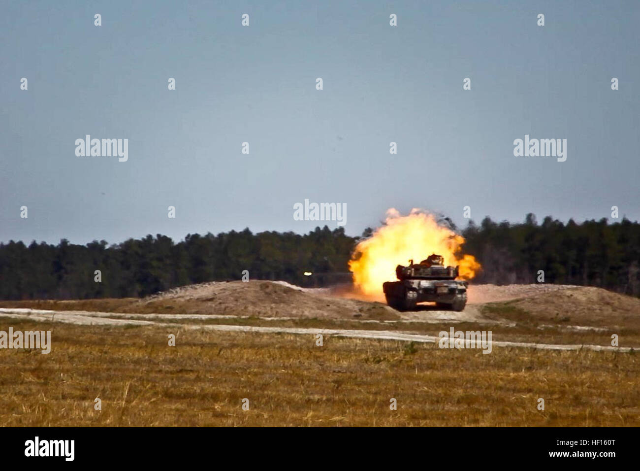 A tank with 2nd Tank Battalion, 2nd Marine Division, fires its weapon ...