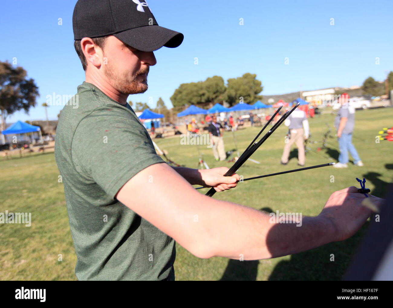 Marine veteran Cpl. Luke Prentice, from Chicago, retrieves his arrows ...