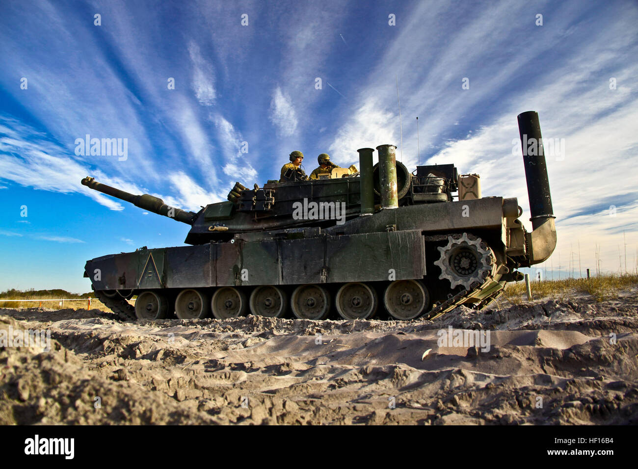 The sounds of a 70-ton tracked machine interrupted the usual soothing ...