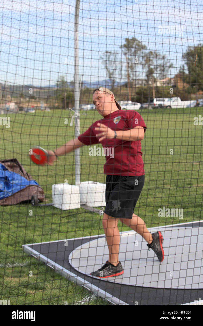 Cpl. Scott Casimiro, with Wounded Warrior Battalion East, throws a ...