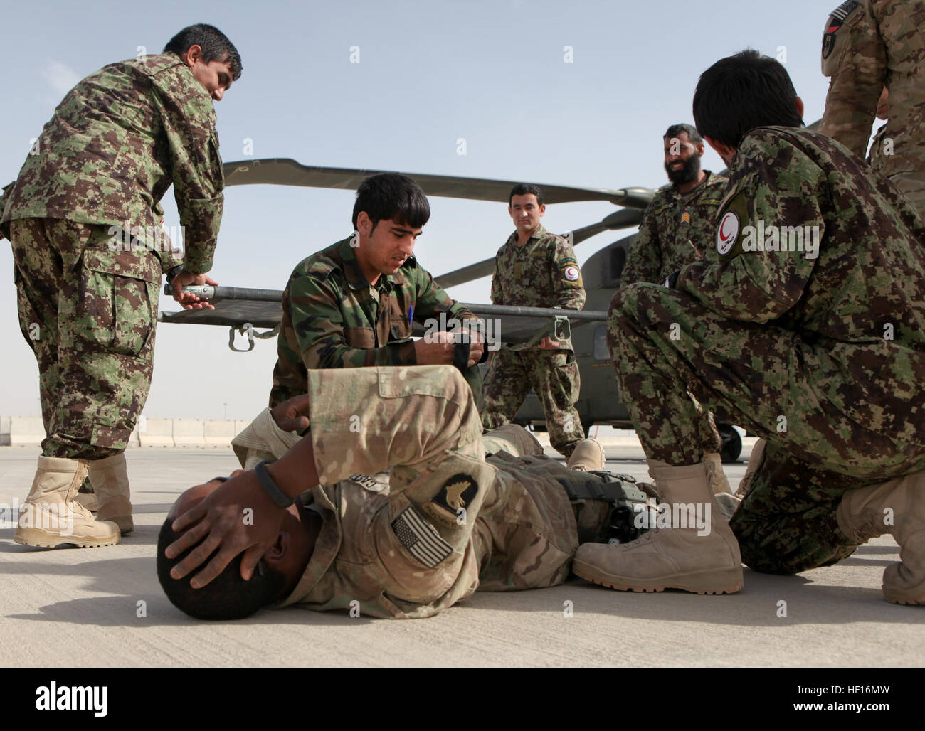 Afghan National Army medics treat a simulated patient at Camp Bastion ...