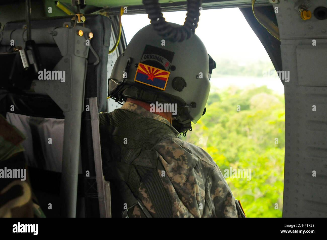 OLON, Panama - A crewmember from 2/285th Assault Helicopter Battalion ...