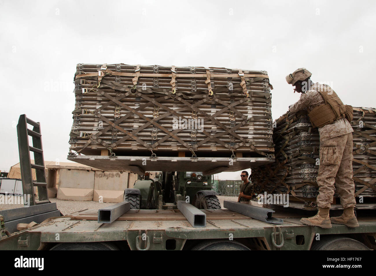 U.S. Marine Lance Cpl. Jimmy L. Youngblood Jr., right, a motor ...