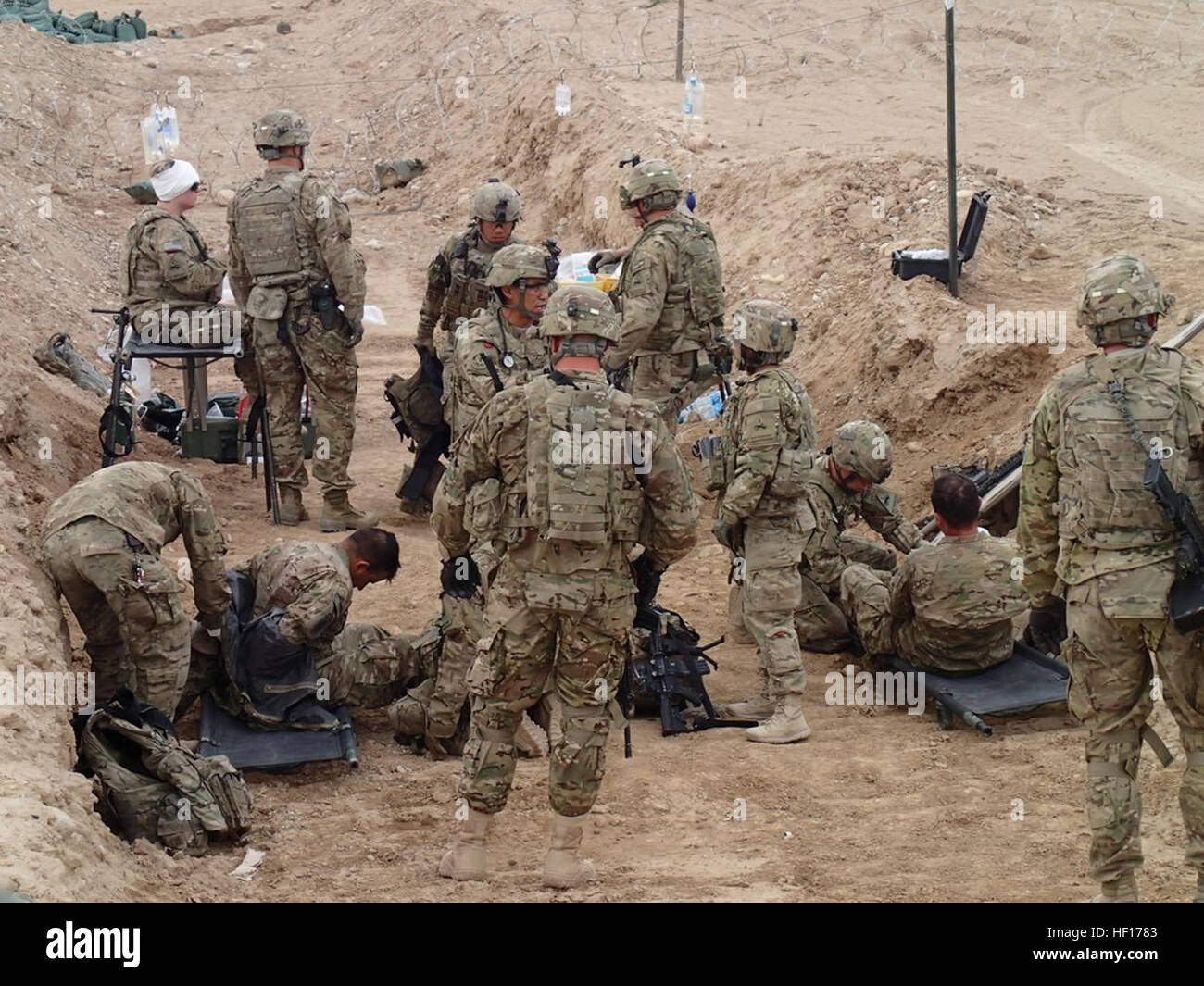 Capt. Jennifer Dyrcz (rear left), public affairs officer for 1st ...