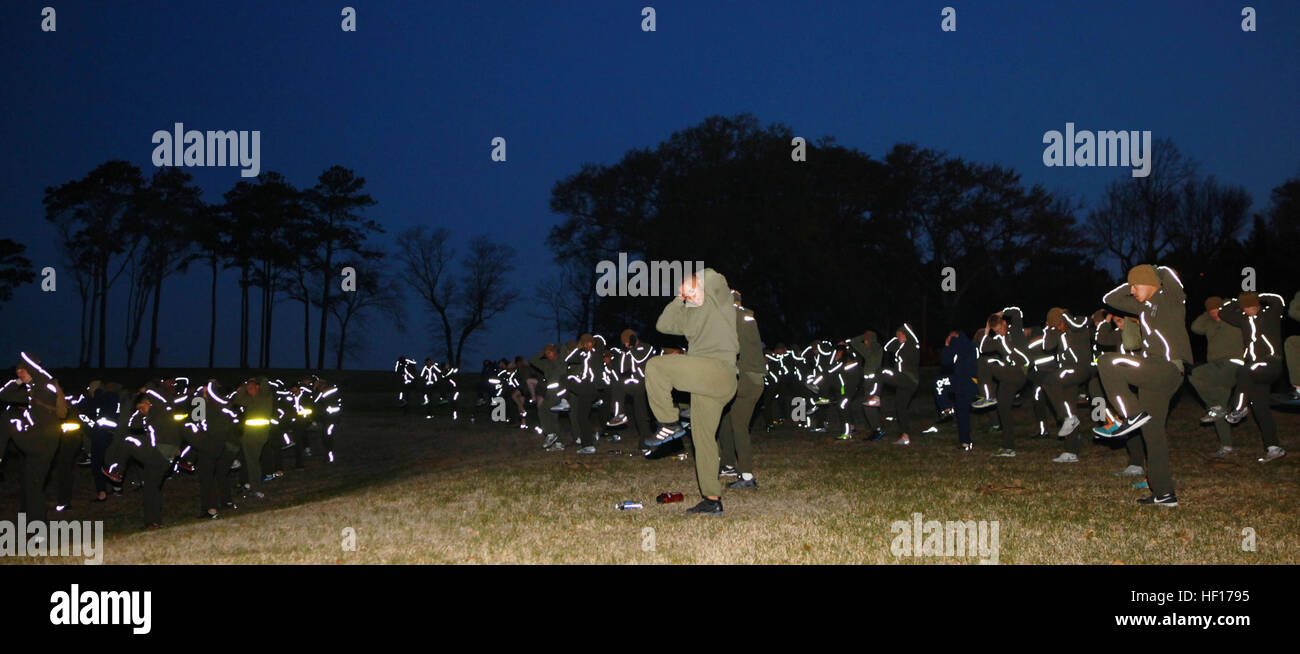 Servicemembers perform steam engines during a workout with Sgt. Maj ...