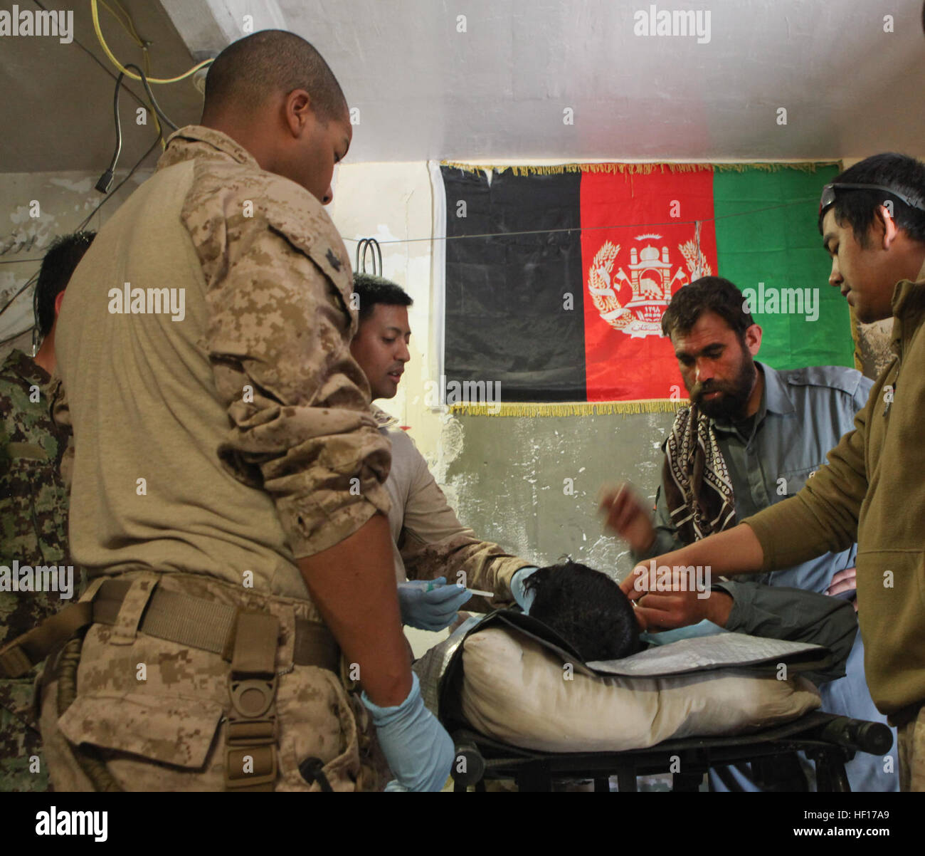 Medics with the Kajaki District Afghan Local Police and Afghan National ...