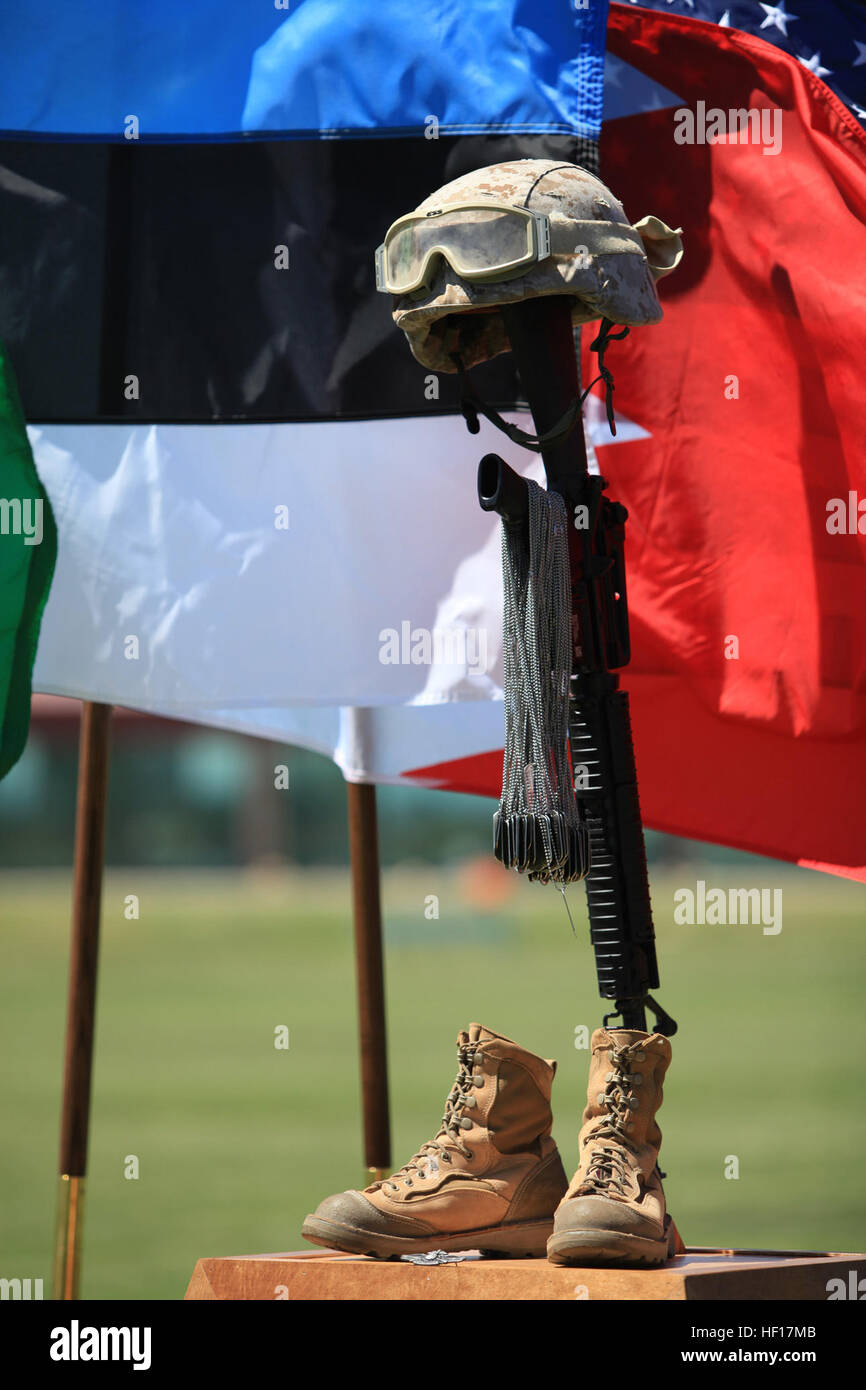 A battle cross sits on display before the Regional Command (Southwest ...
