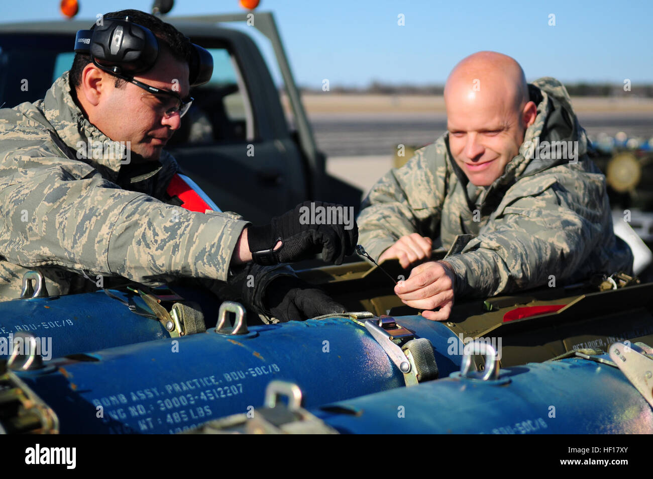 Weapons specialists Staff Sgt. Jaime Alonzo (left) and Tech. Sgt ...