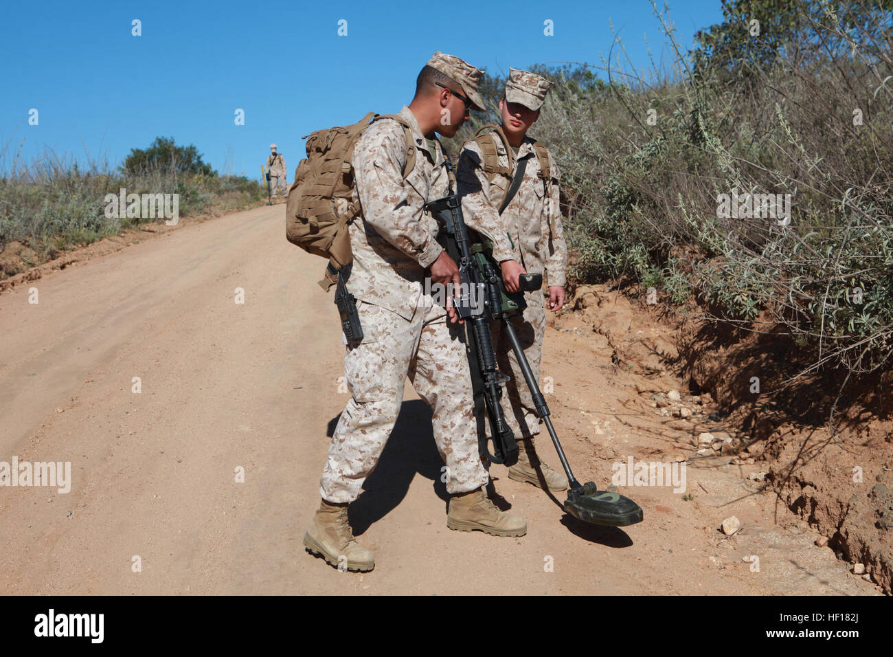 Sergeant Juan Ortiz, left, a combat engineer with 2nd Platoon, Bravo ...
