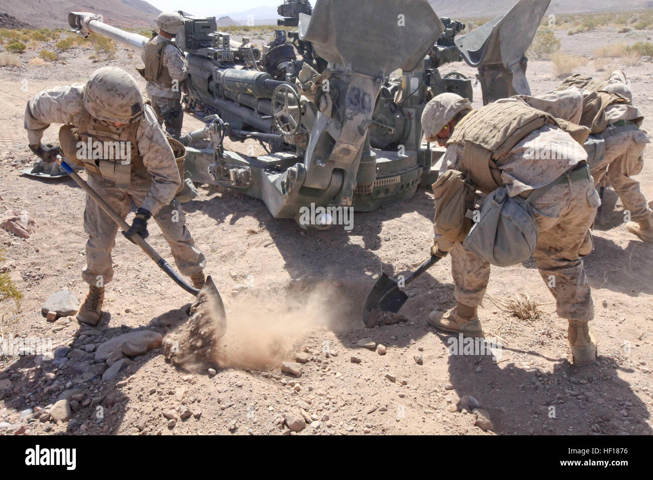 U.S. Marines with Battery I, 3rd Battalion 12th Marine Regiment dig ...
