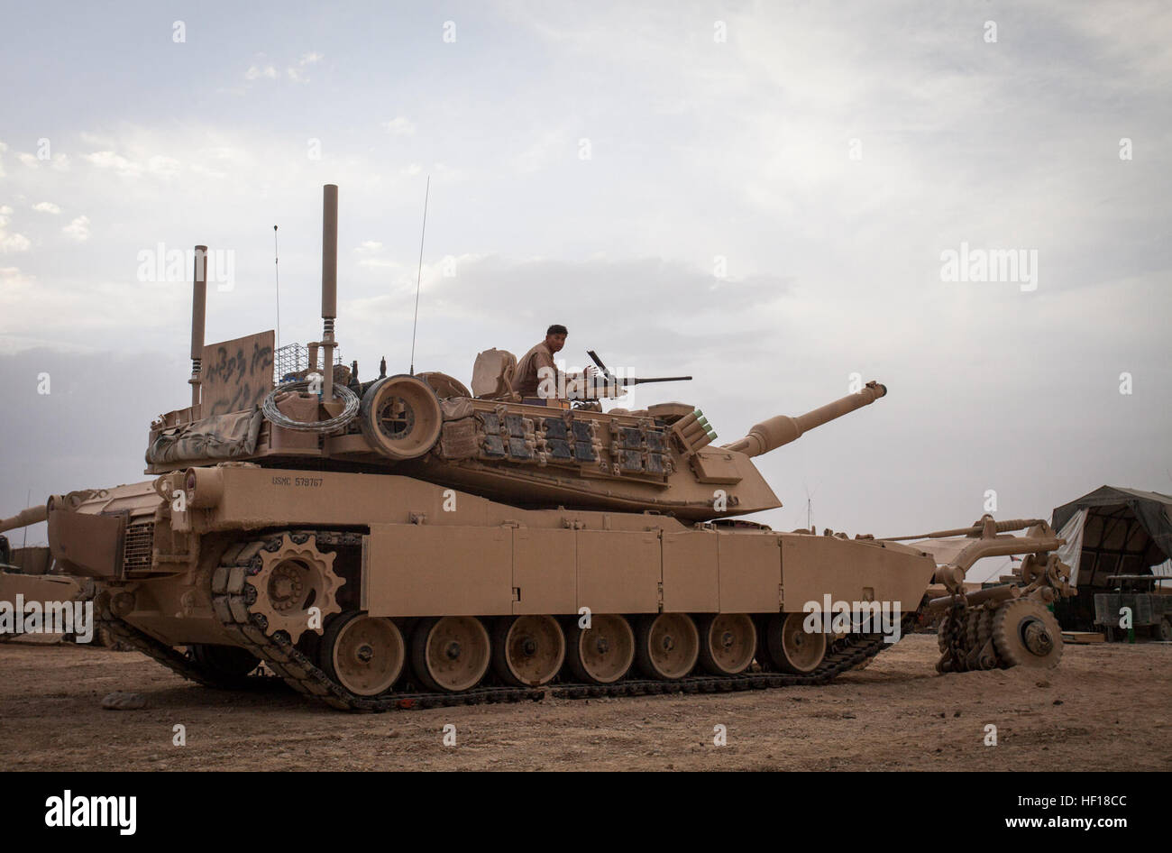 U.S. Marine Corps Lance Cpl. Phillip Lim, a gunner assigned to Delta ...