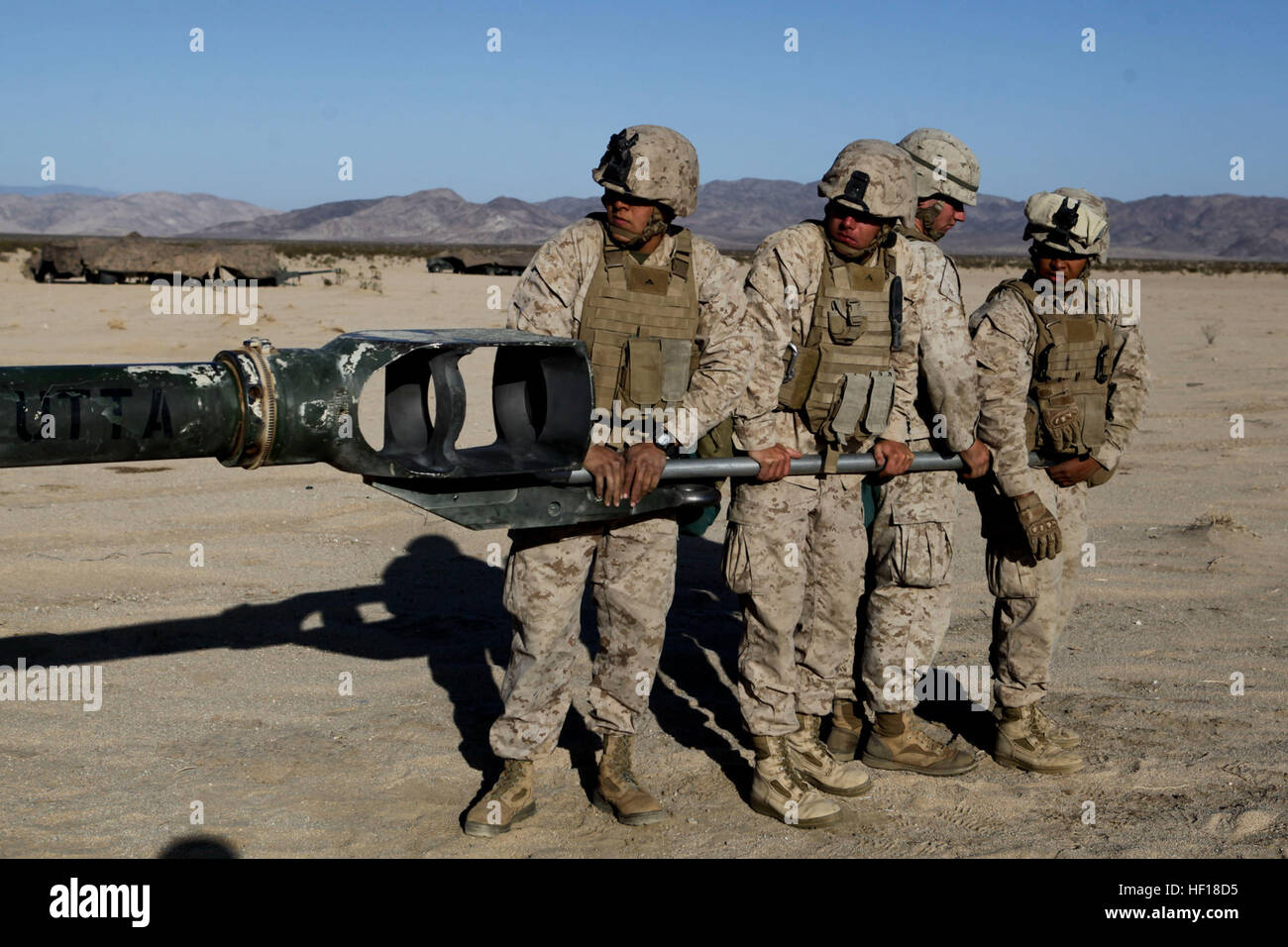 U.S. Marines with Battery G, 2nd Battalion, 11th Marine Regiment adjust ...