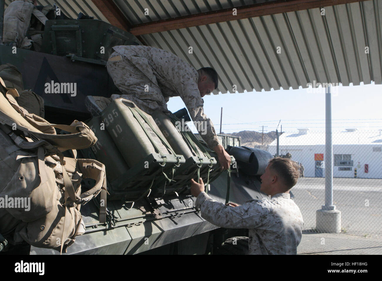 Left to right, U.S. Marine Corps Cpl. Leonardo Saldivar, a Light ...