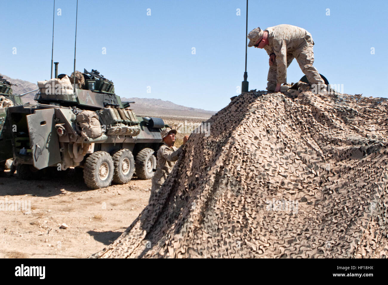 U.S. Marine Corps Lance Cpl. Daniel Amores, bottom left and Lance Cpl ...