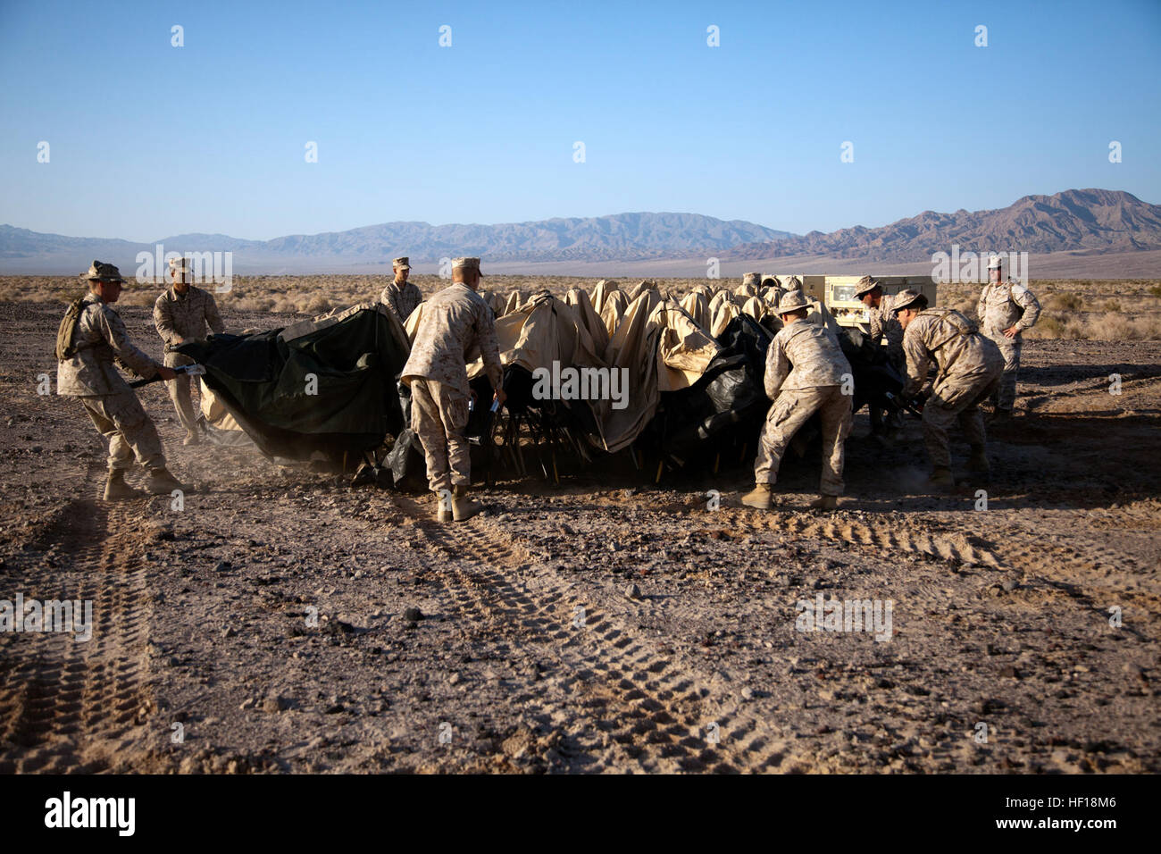 U.S. Marines with 5th Marine Regiment, 1st Marine Division construct ...
